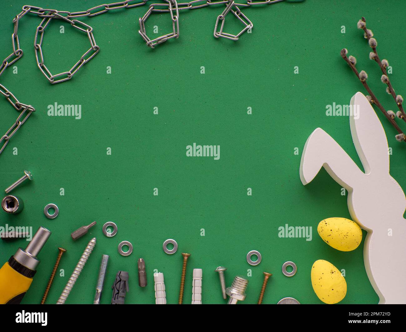 Easter background with hand tools, fasteners, fittings, eggs and white ...