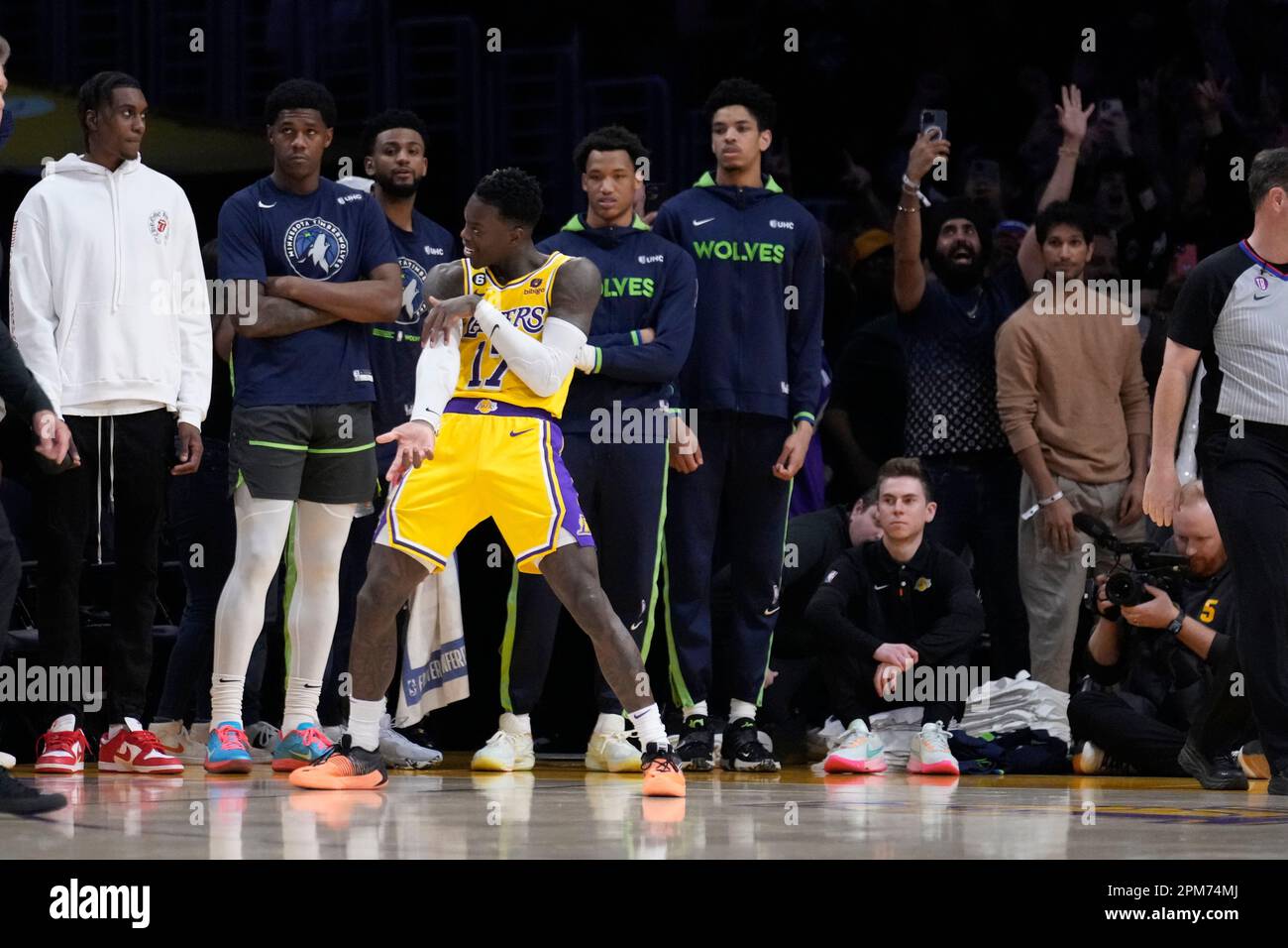 Los Angeles Lakers guard Dennis Schroder (17) celebrates in front to ...