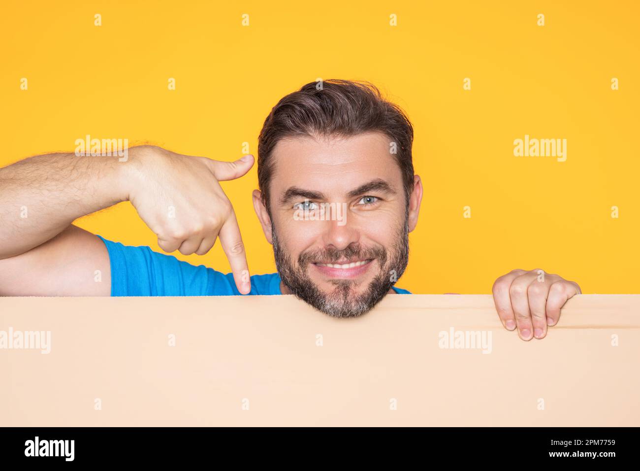 Man holds sign, blank card. Placard ready for your product. Sign to ...