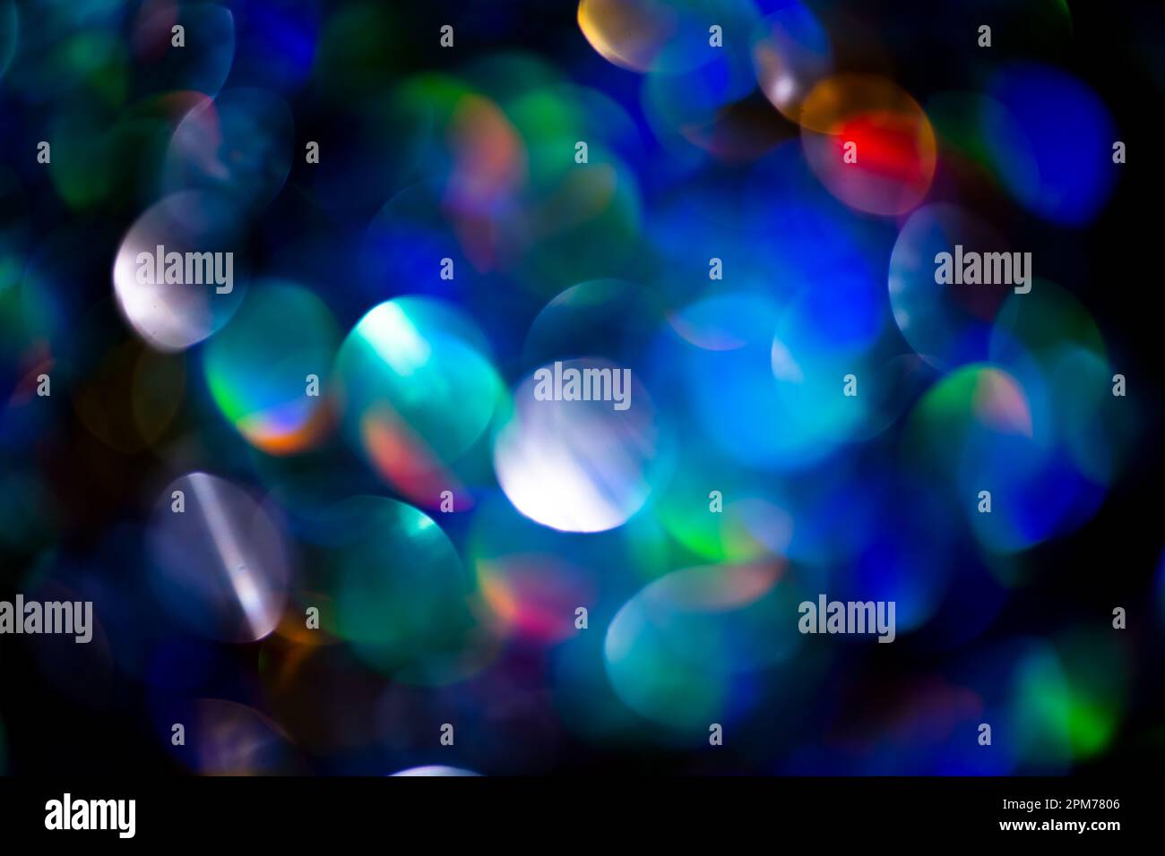 Colorful glitter lights background. Defocused bokeh. Lights texture. Blurred boke light ...