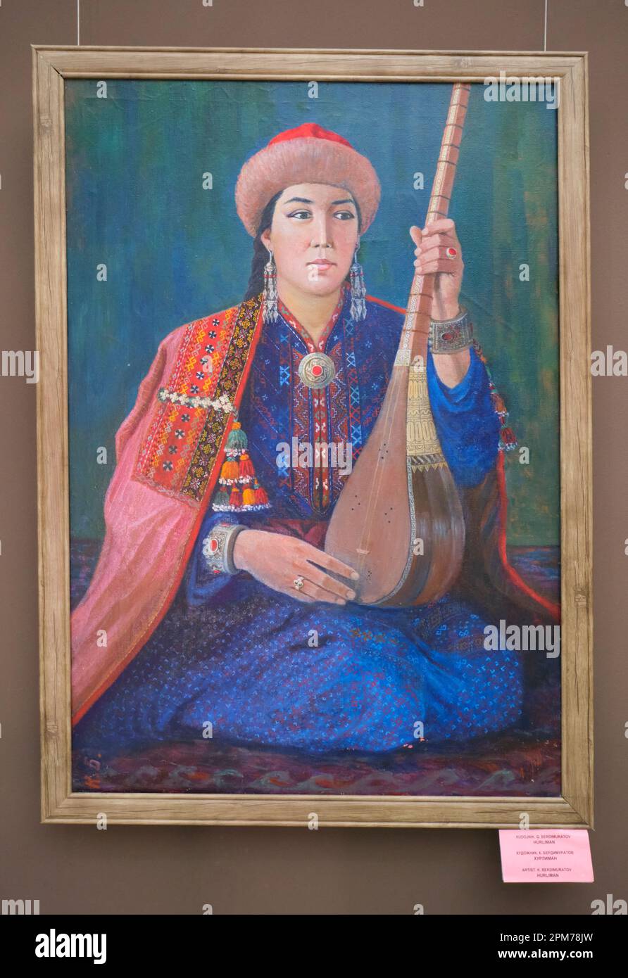 A portrait of the famous woman leader, Hurliman, with the dombra ...