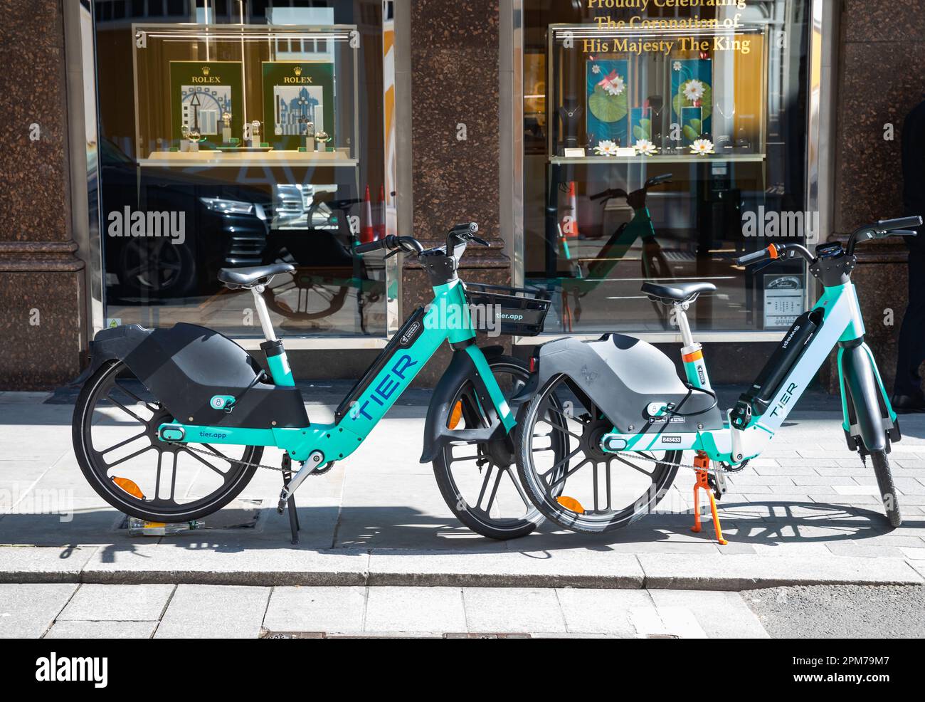 Tier Electric bikes parked outside a jewellers in Old Bond Street ...