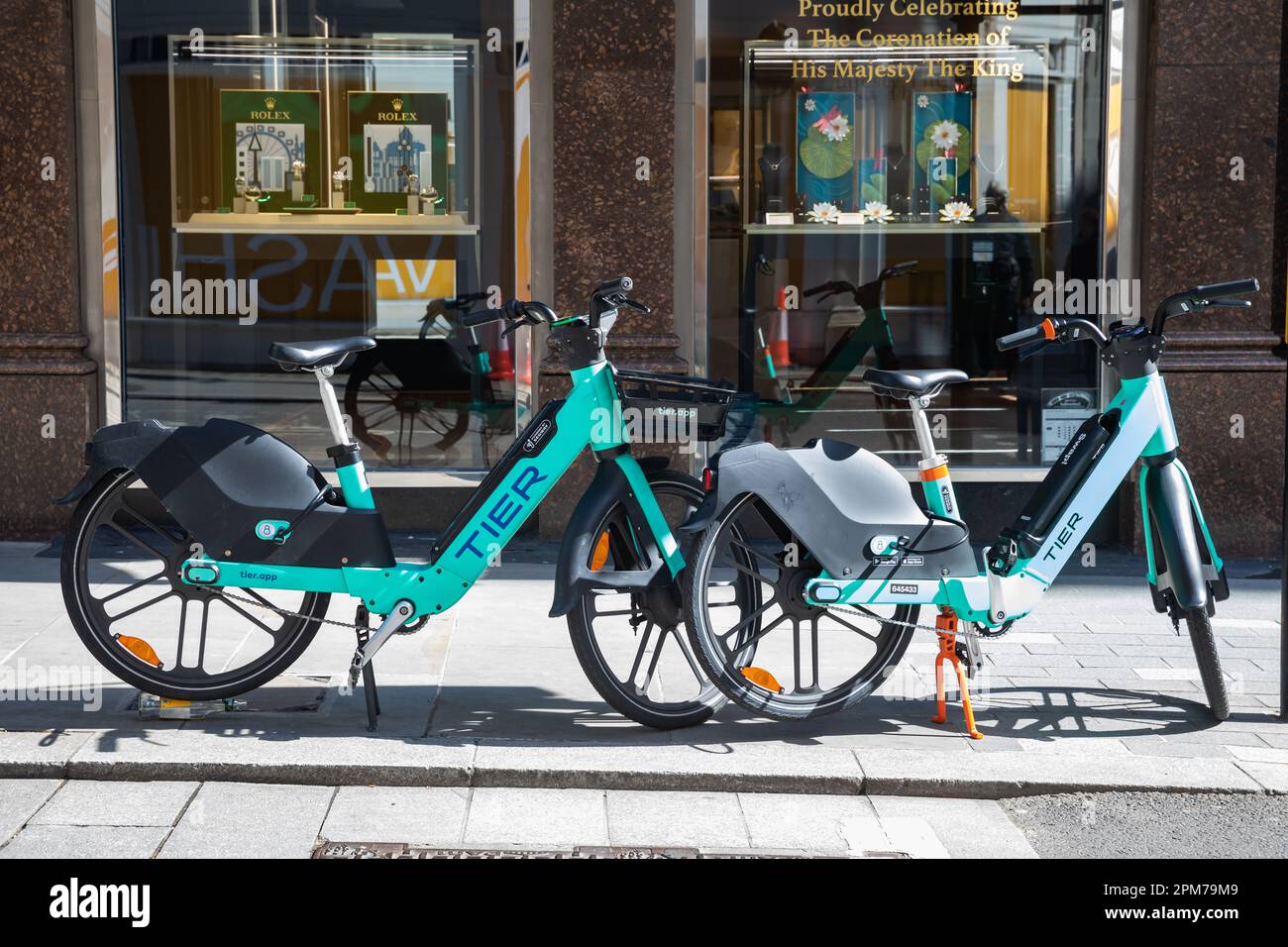 Tier Electric bikes parked outside a jewellers in Old Bond Street ...