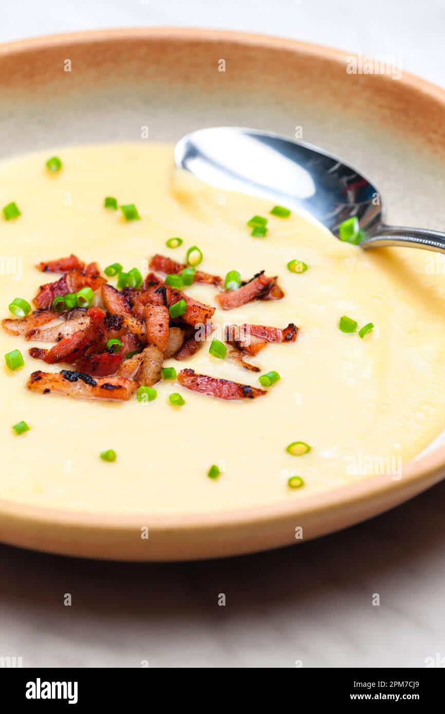 yellow peas porridge with bacon strips Stock Photo - Alamy