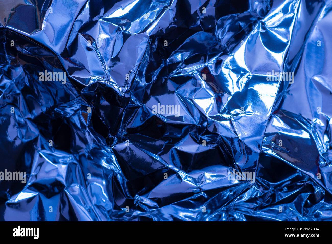 Blue shades holographic foil. Trendy background texture Stock Photo - Alamy