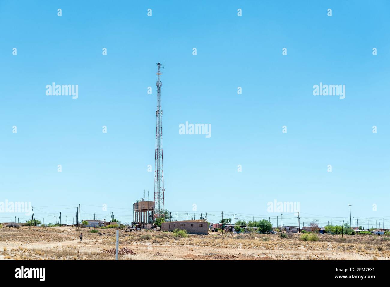 Kenhardt, South Africa - Feb 28 2023: Township houses, a water ...