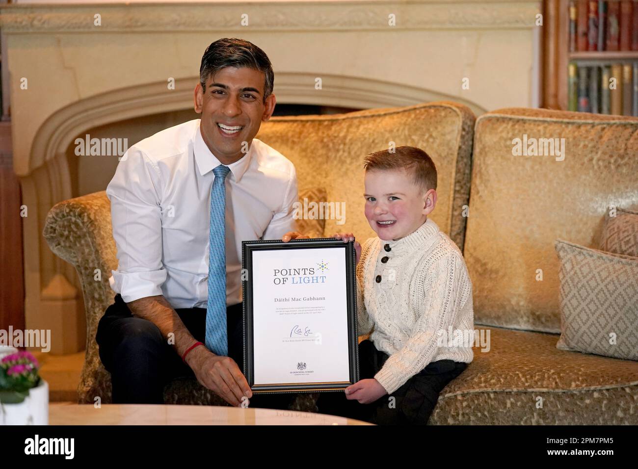 Prime Minister Rishi Sunak presents six-year-old Daithi Mac Gabhann ...