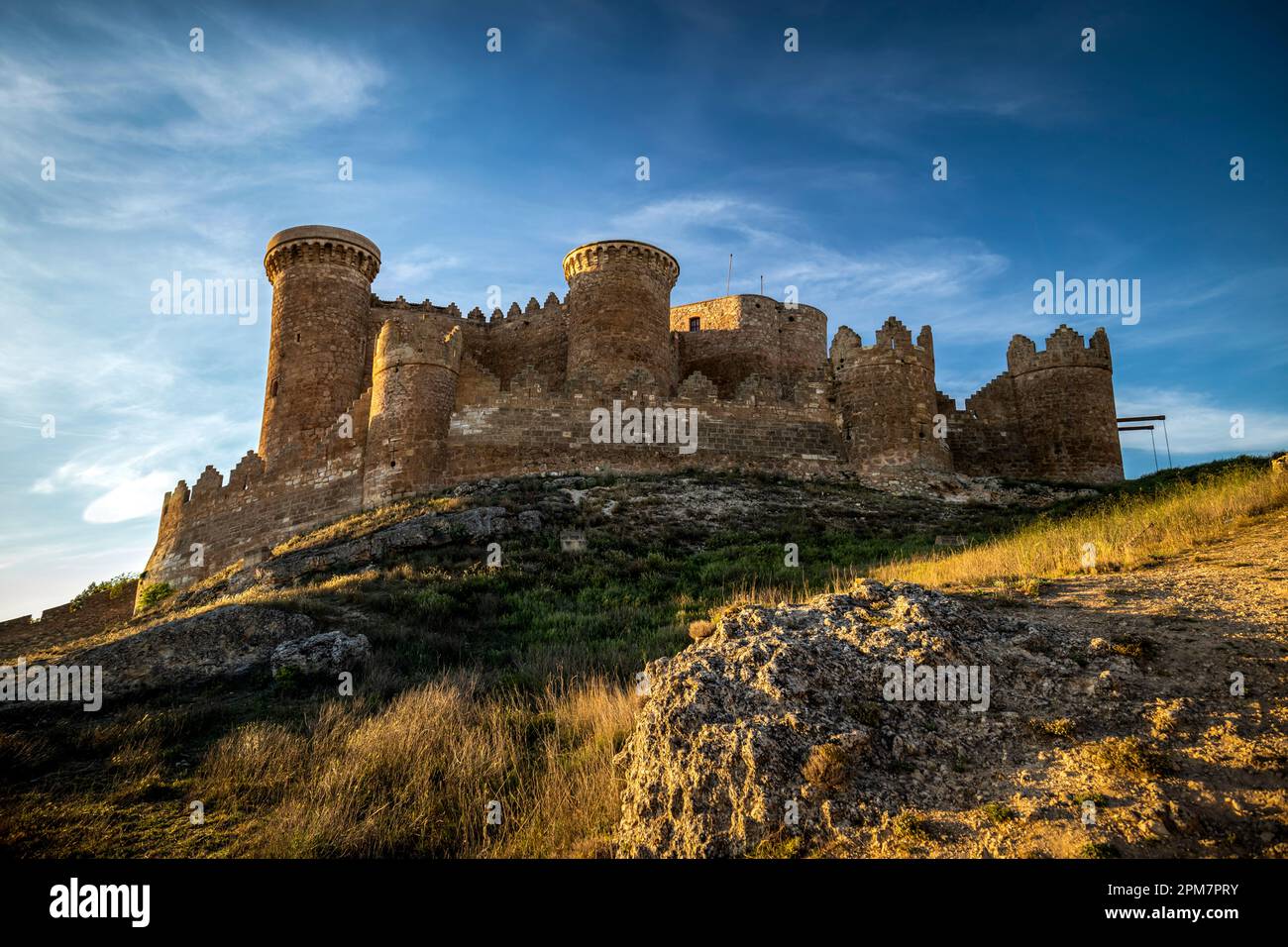 View of the impressive medieval fortress and castle of Belmonte in ...