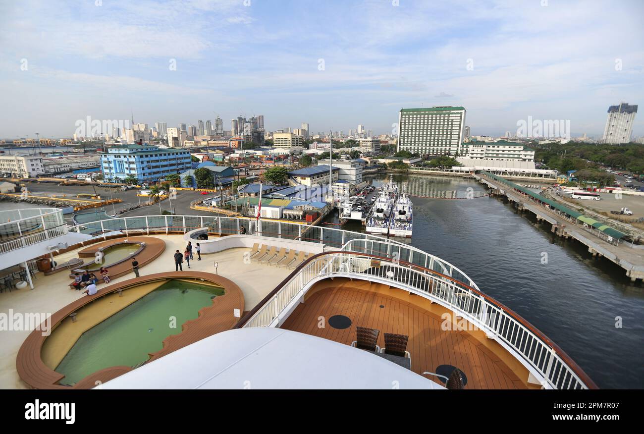 Cruise ship docked in Manila South Harbor near the Philippine Coast ...