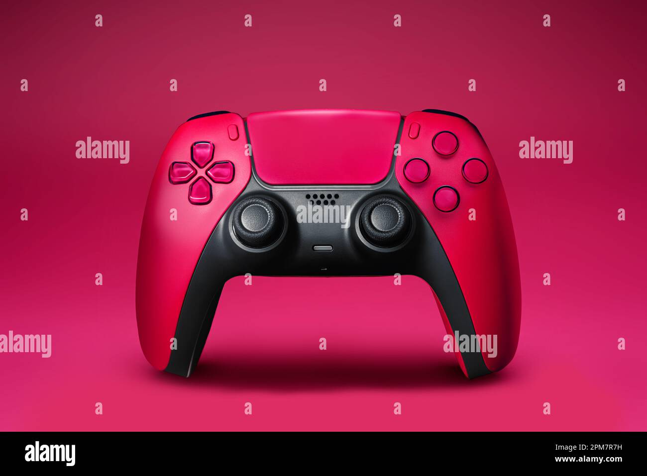 Game console controller, cosmic red, on red background with shadows ...