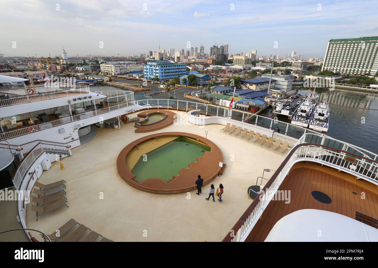 Cruise ship docked in Manila South Harbor near the Philippine Coast ...