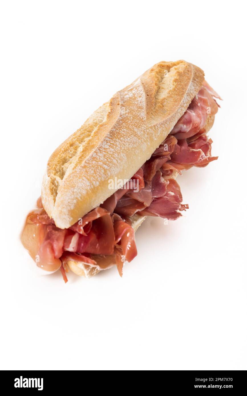 Spanish serrano ham sandwich isolated on white background Stock Photo ...