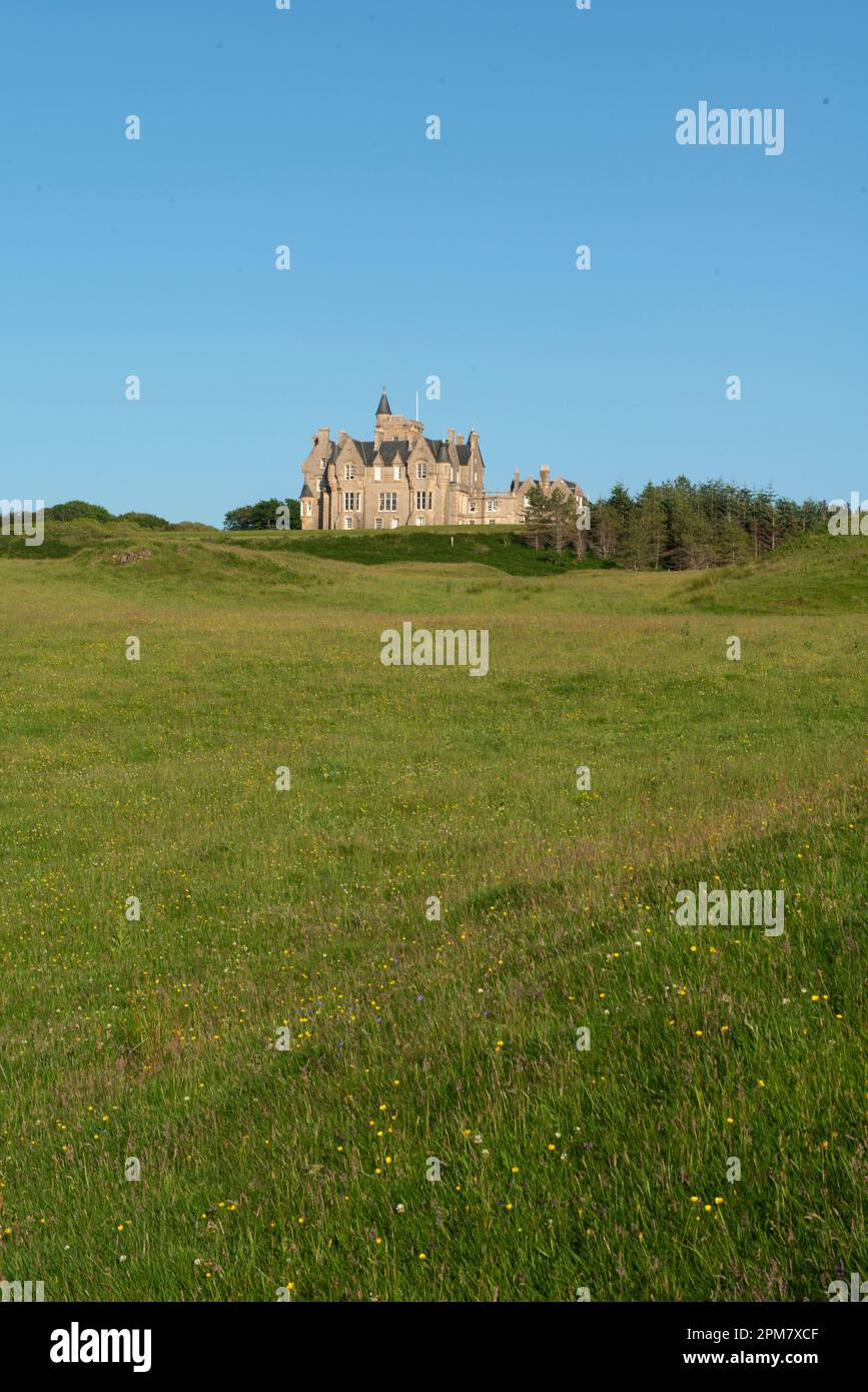 Glengorm Castle across fields, near Tobermory, Isle of Mull, Scotland ...