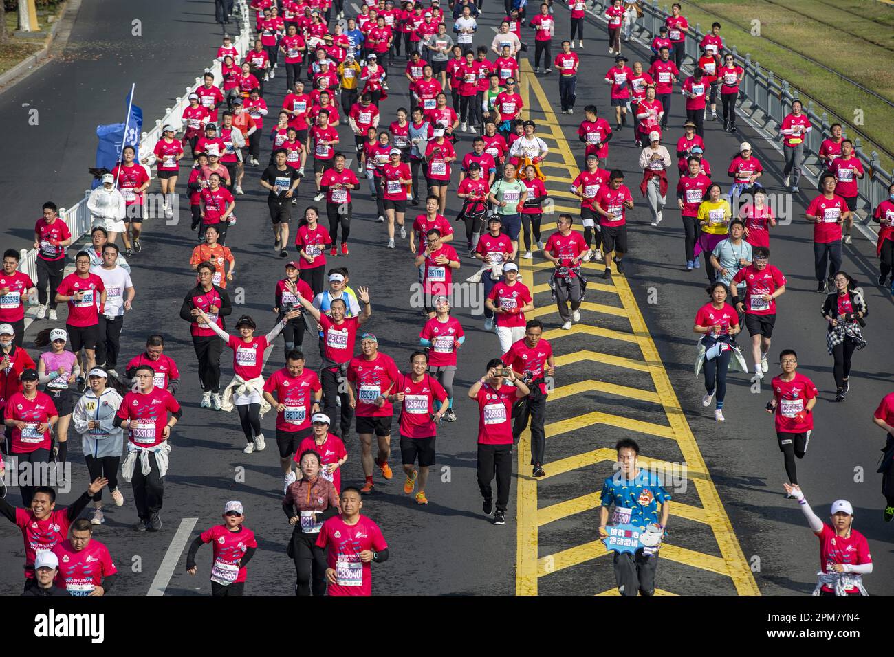 Aerial photo shows people running at the Huai'an Marathon in Huai'an ...