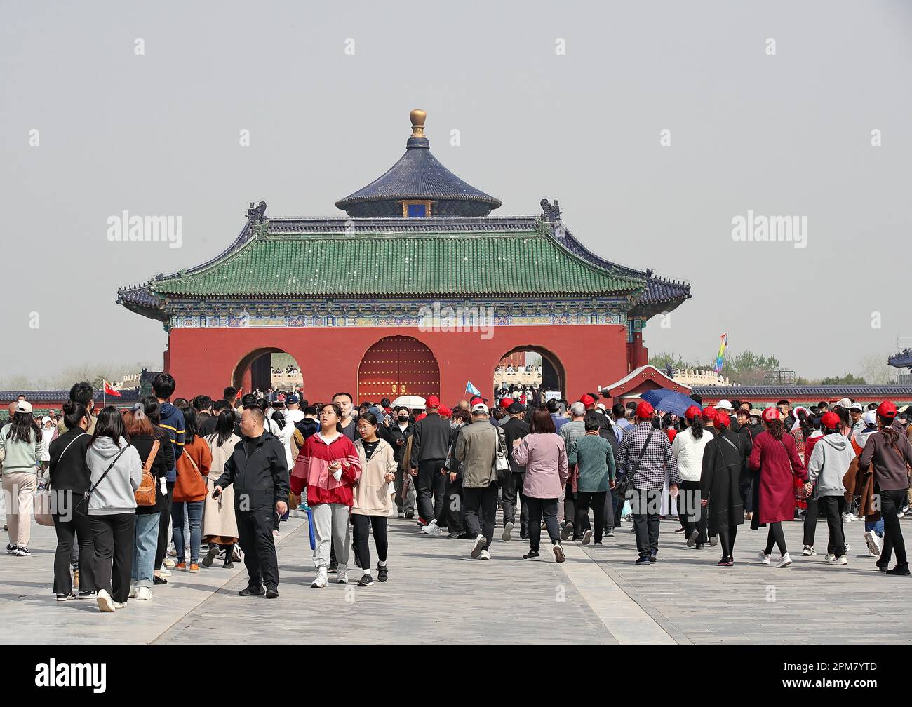 Tourists bustle in front of the Hall of Prayer for Good Harvests in the ...