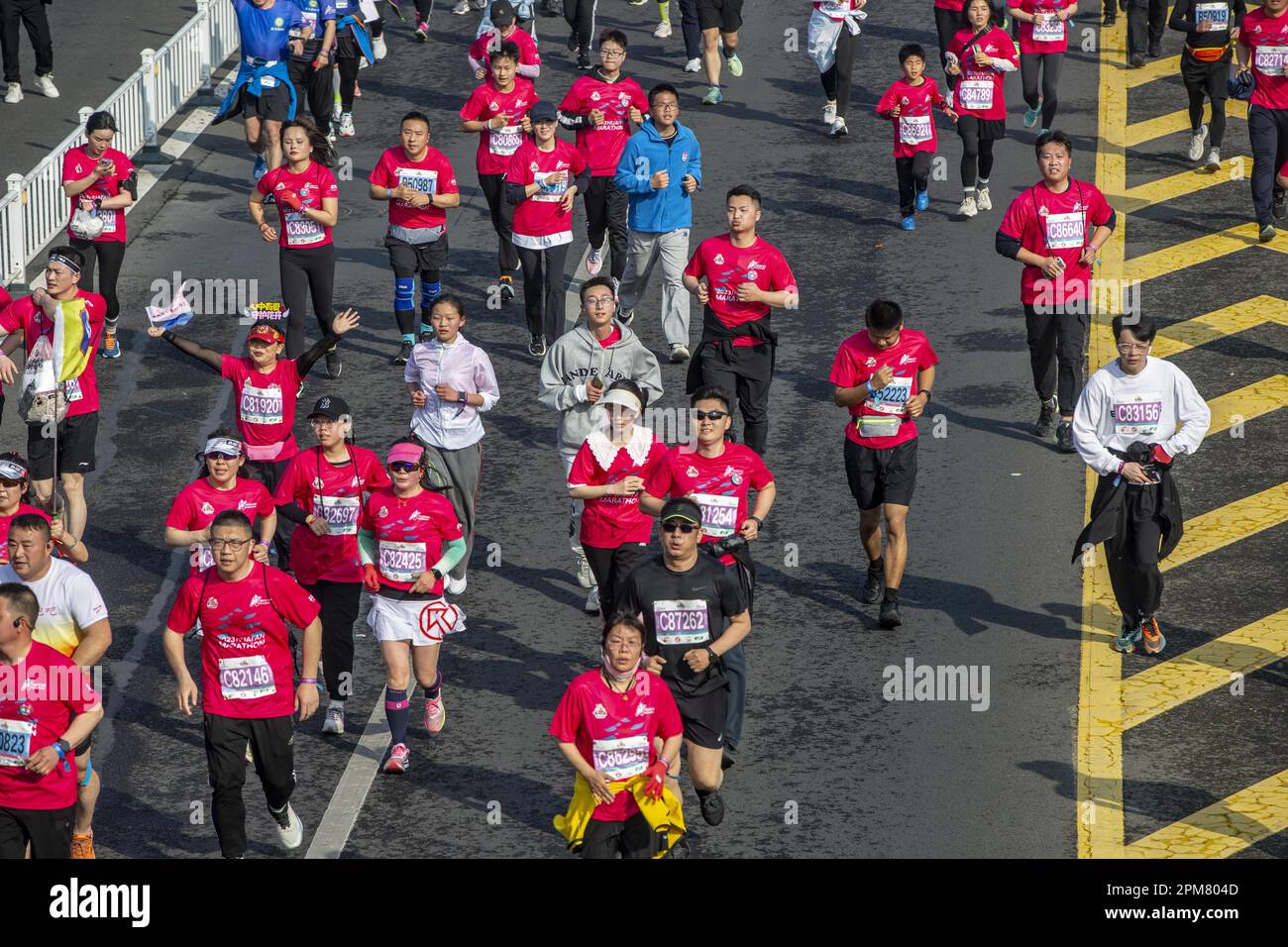 Aerial photo shows people running at the Huai'an Marathon in Huai'an ...