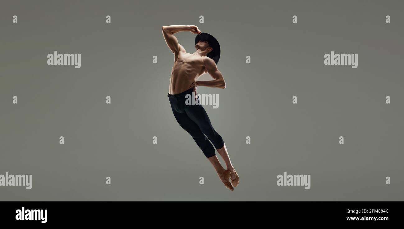 Artistic, handsome, young man, ballet dancer making performance in ...