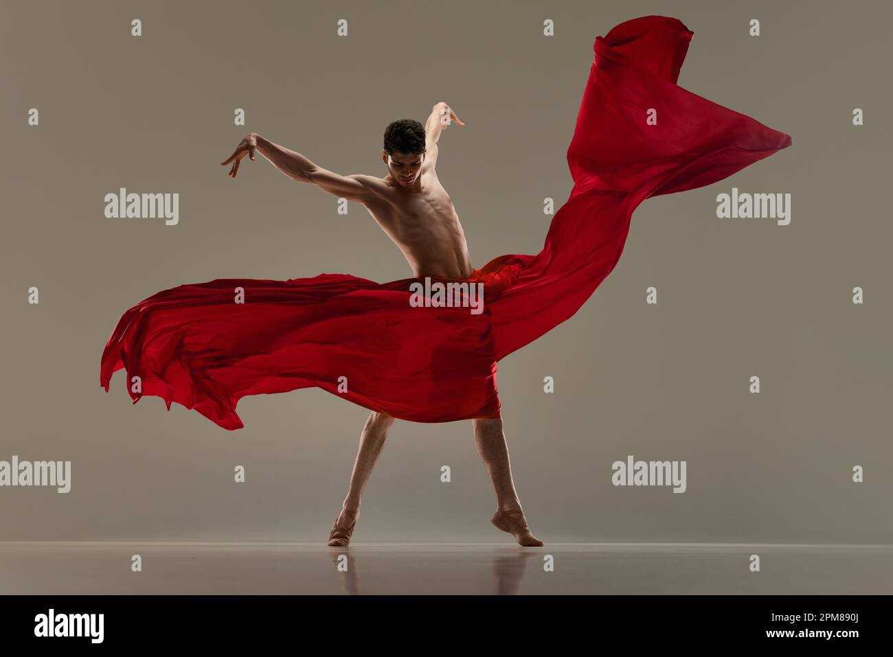 Impression. Handsome young man, professional ballet dancer dancing with ...