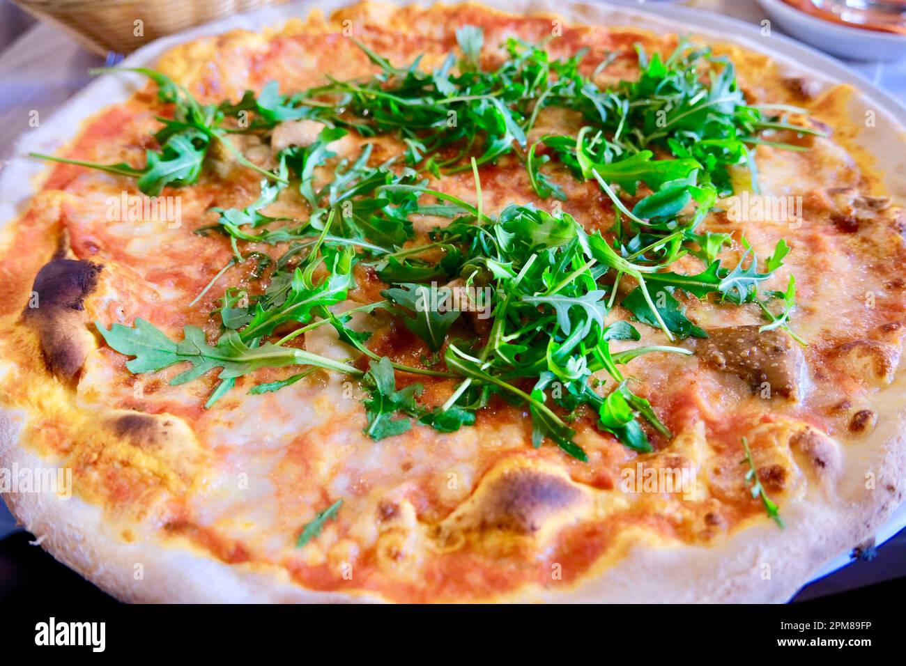 Italy, Lombardy, Milan, pizza al tartufo (pizza with truffle olive oil ...
