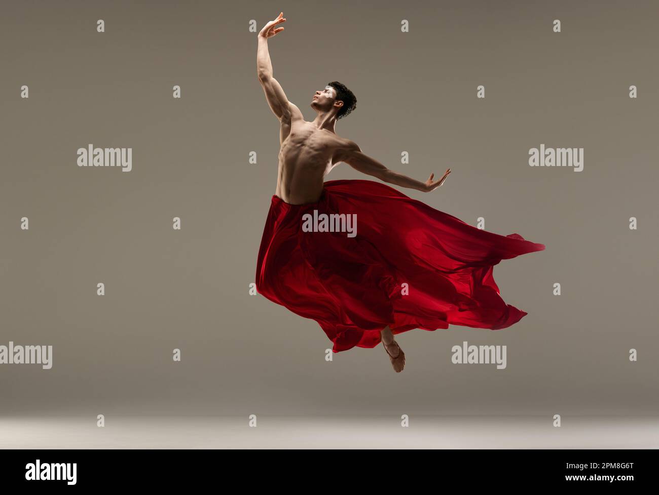 Young, athletic, handsome man, ballet dancer making performance with ...