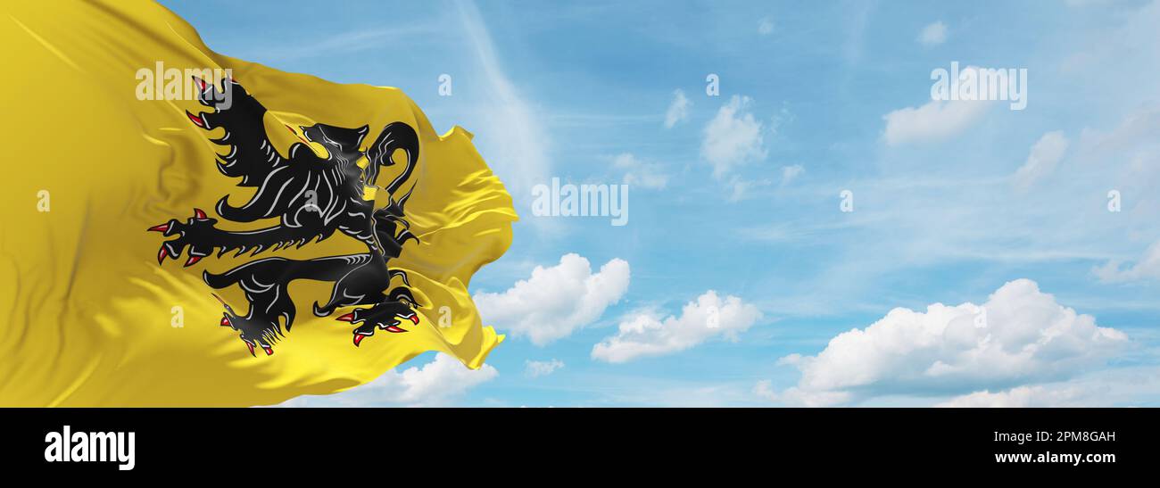 flag of Dutch peoples Flanders at cloudy sky background, panoramic view ...