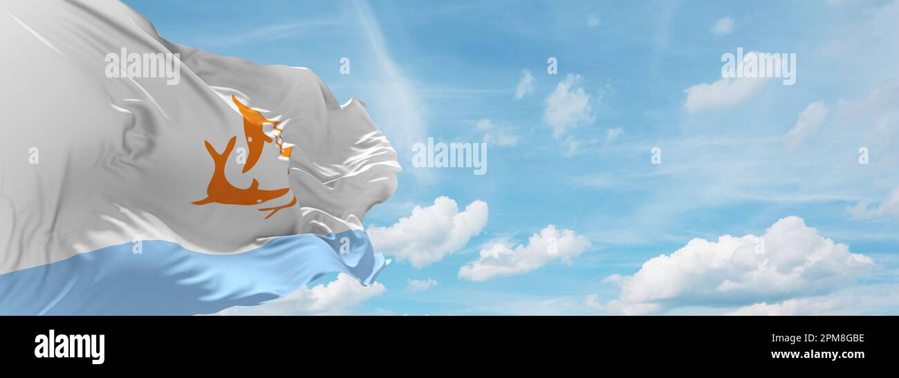 flag of English Creole peoples Anguillians at cloudy sky background ...