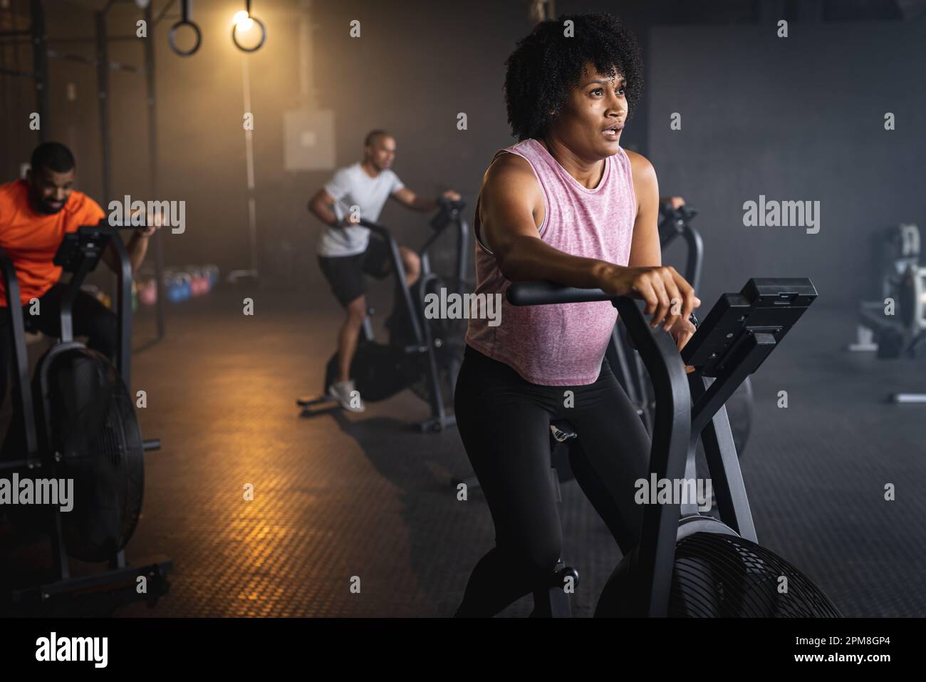 Biracial male cycling on bike hi-res stock photography and images - Alamy