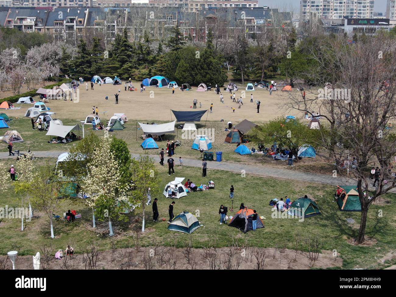Aerial photo shows people spending weekends in tents at Taifeng Park in ...