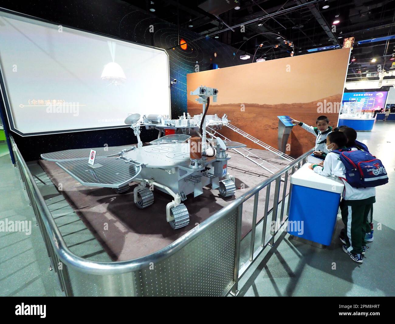 BEIJING, CHINA - APRIL 12, 2023 - Children experience a model of the ...