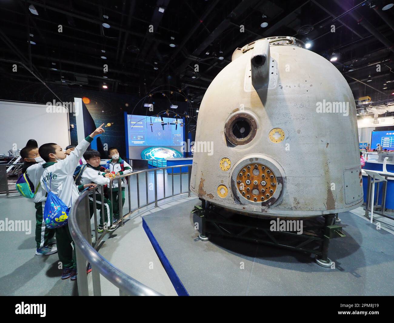 BEIJING, CHINA - APRIL 12, 2023 - Children visit the re-entry module of ...