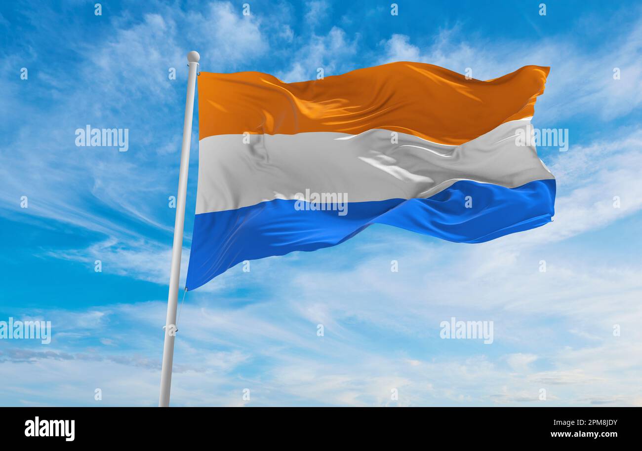 flag of Dutch peoples Prinsenvlag at cloudy sky background, panoramic ...