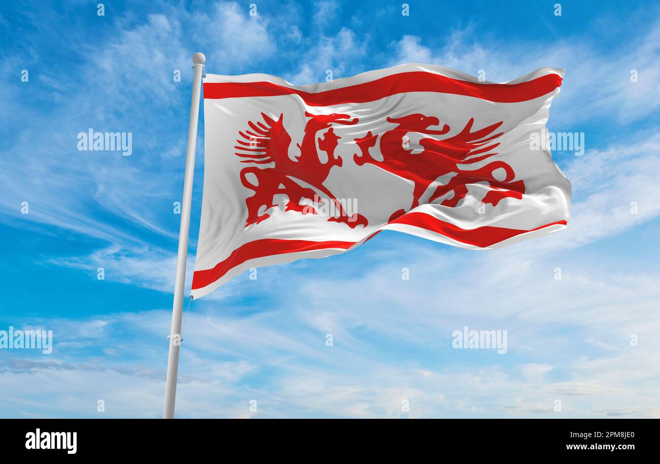 flag of Dutch peoples Stellingwarfs at cloudy sky background, panoramic ...