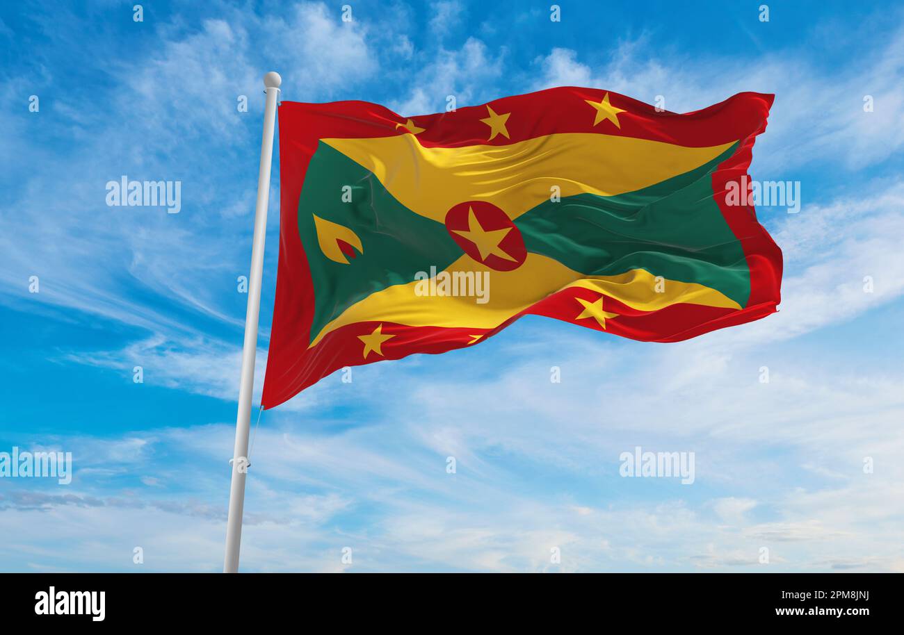 flag of English Creole peoples Grenadians at cloudy sky background ...