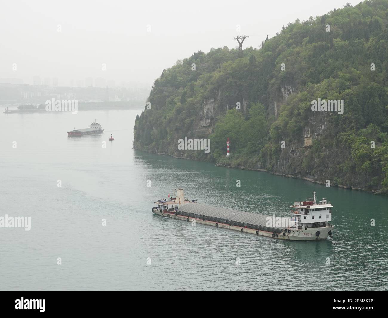 YICHANG, CHINA - APRIL 12, 2023 - Cargo ships pass through the Three ...