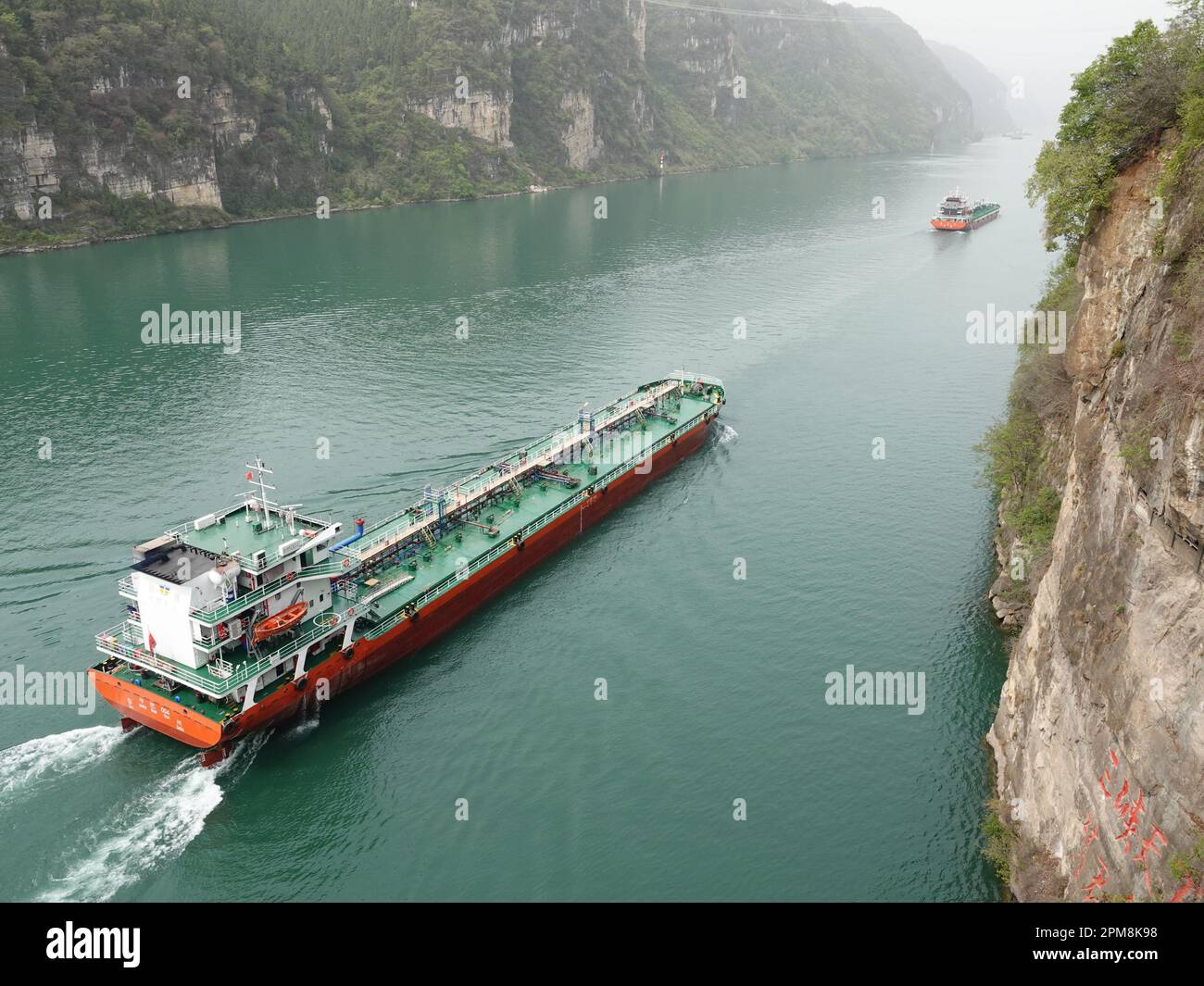 YICHANG, CHINA - APRIL 12, 2023 - Cargo ships pass through the Three ...