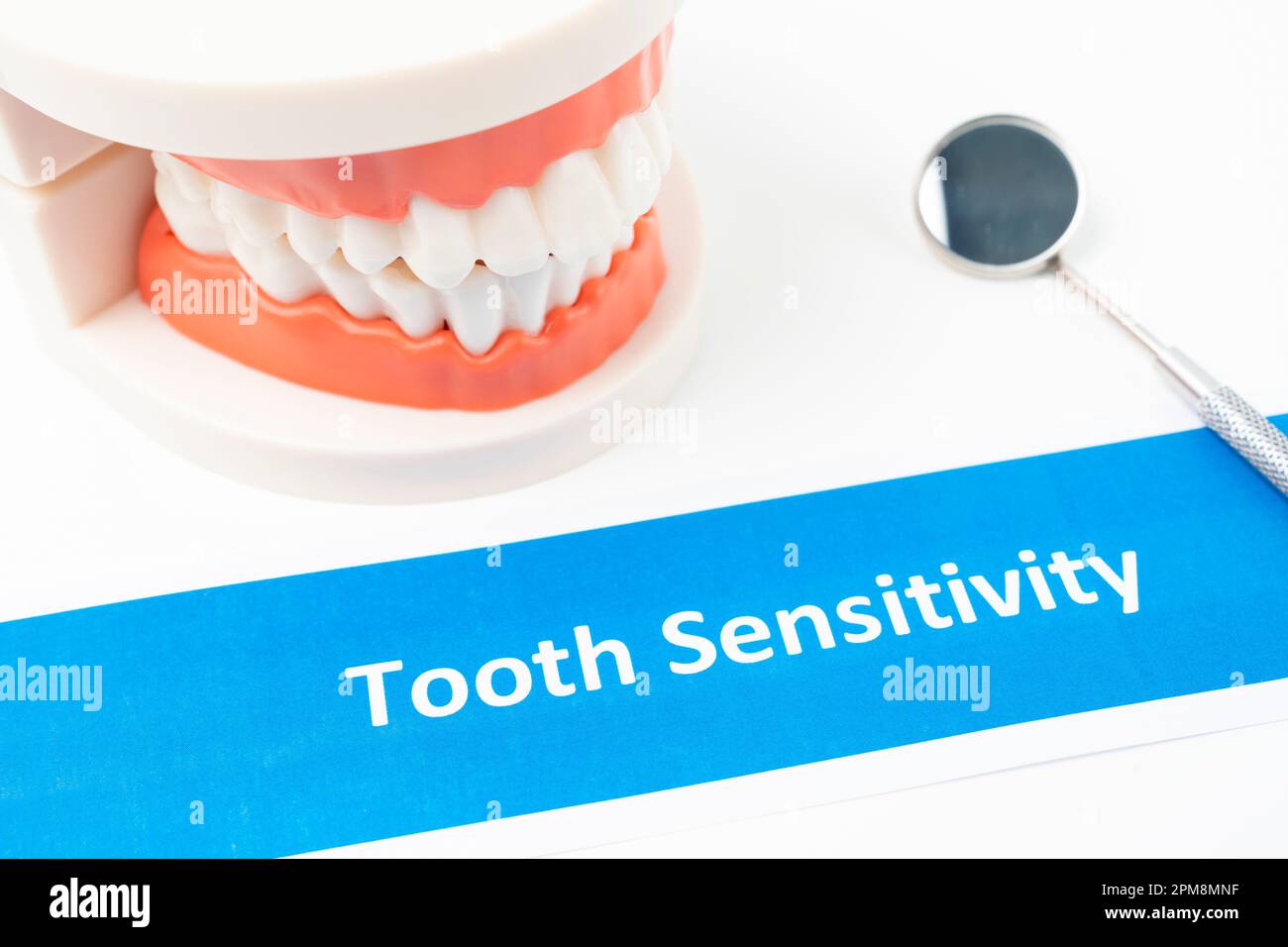 Dentures model with tooth sensitivity dental disease on white ...