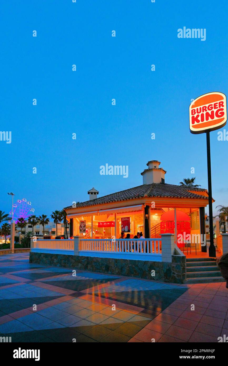 Malaga Benalmadena Mirador Ferris Wheel at twilight and the Burger King ...