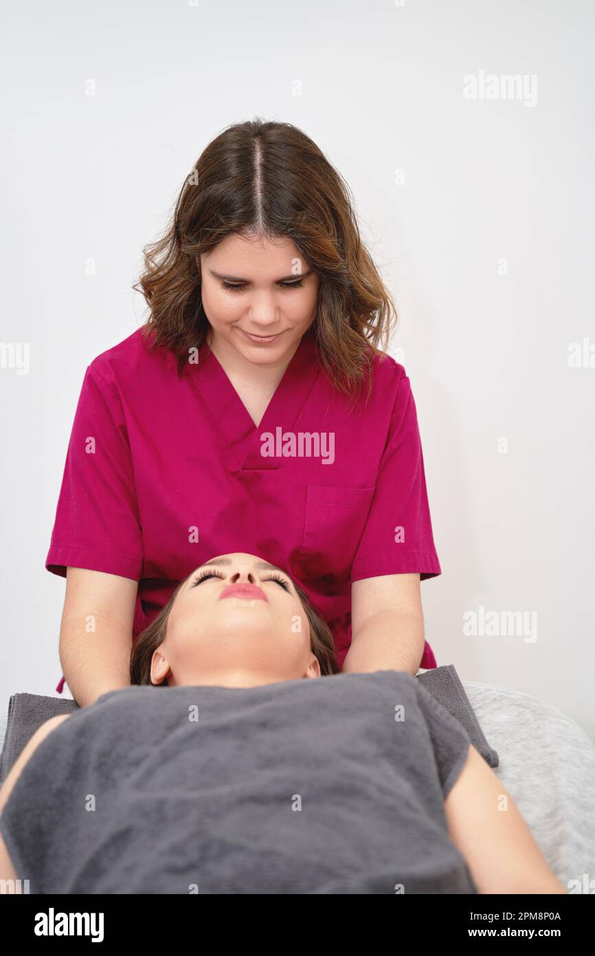 Female Physiotherapist Providing Therapy to Female Patient for Injury Recovery Stock Photo - Alamy