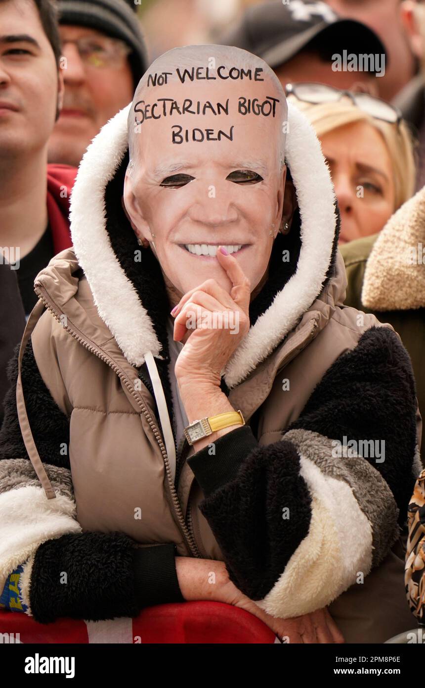 A protester outside Ulster University in Belfast ahead of a keynote ...