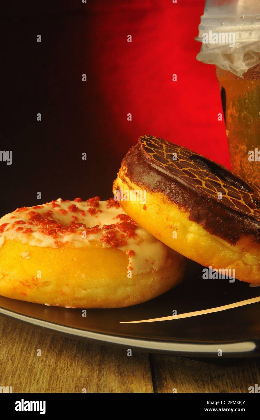 Snack on the table, donuts, a traditional american delicacy on studio ...