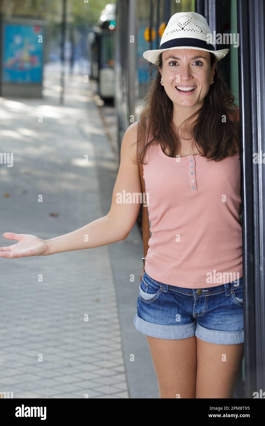 woman boarding a bus Stock Photo - Alamy