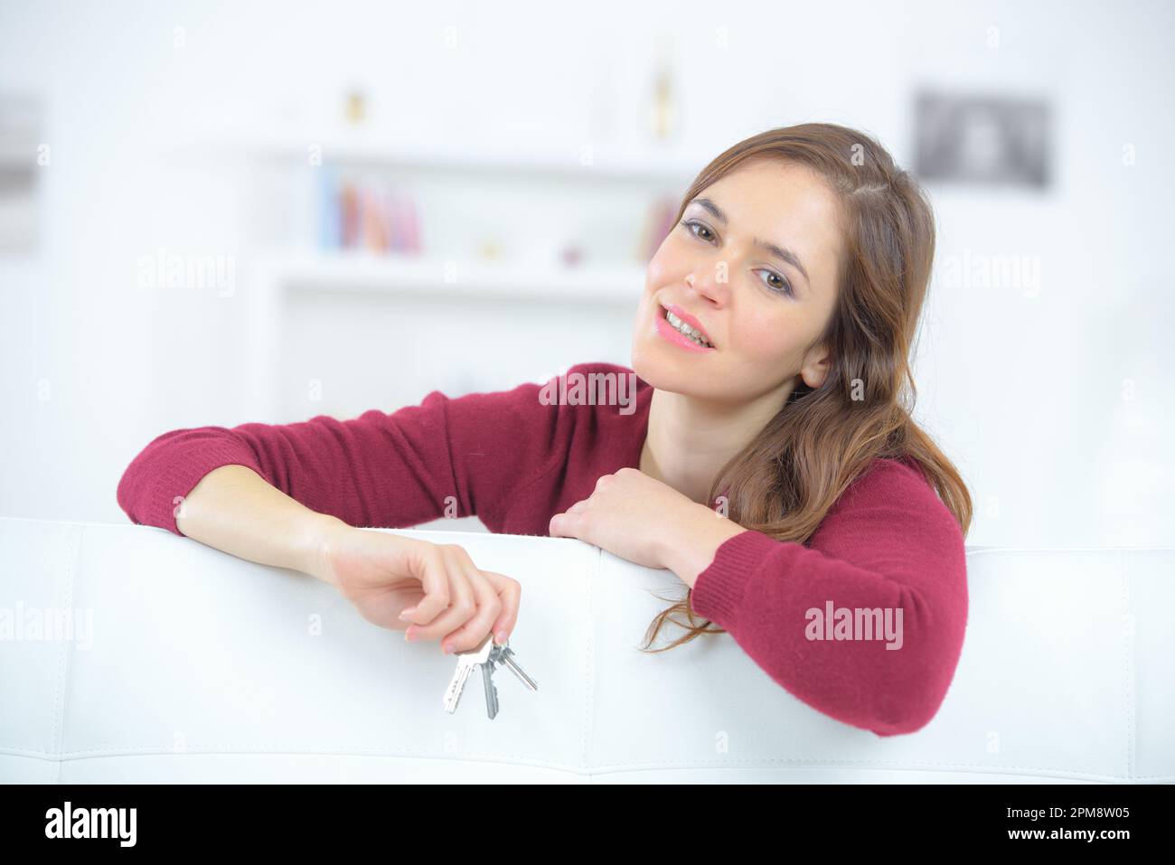 Woman with set of keys hi-res stock photography and images - Alamy