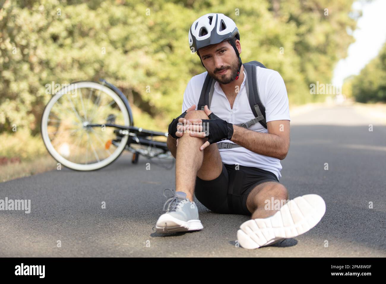 Cyclist fallen from bike hi-res stock photography and images - Alamy