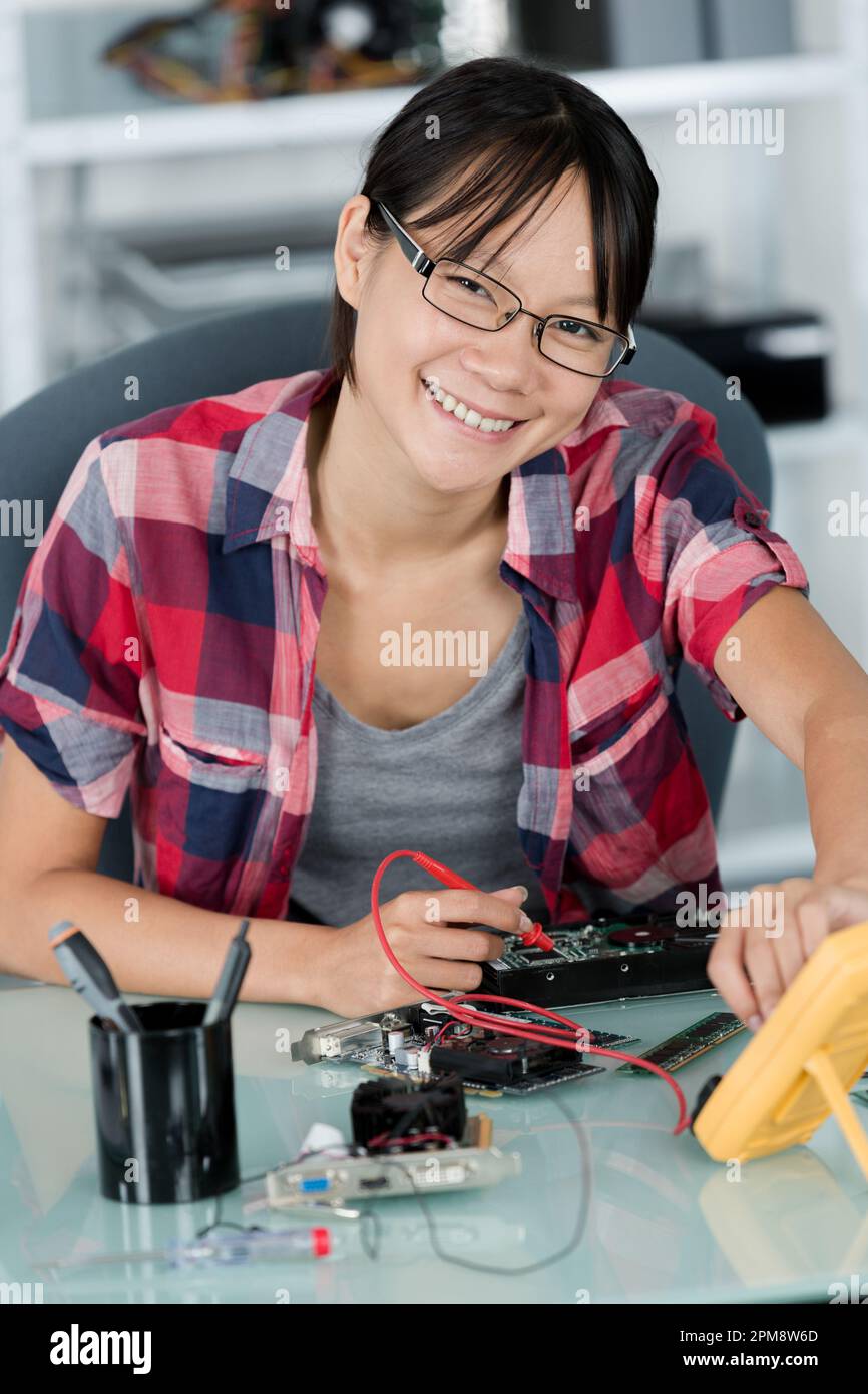 Technician using multimeter hi-res stock photography and images - Alamy