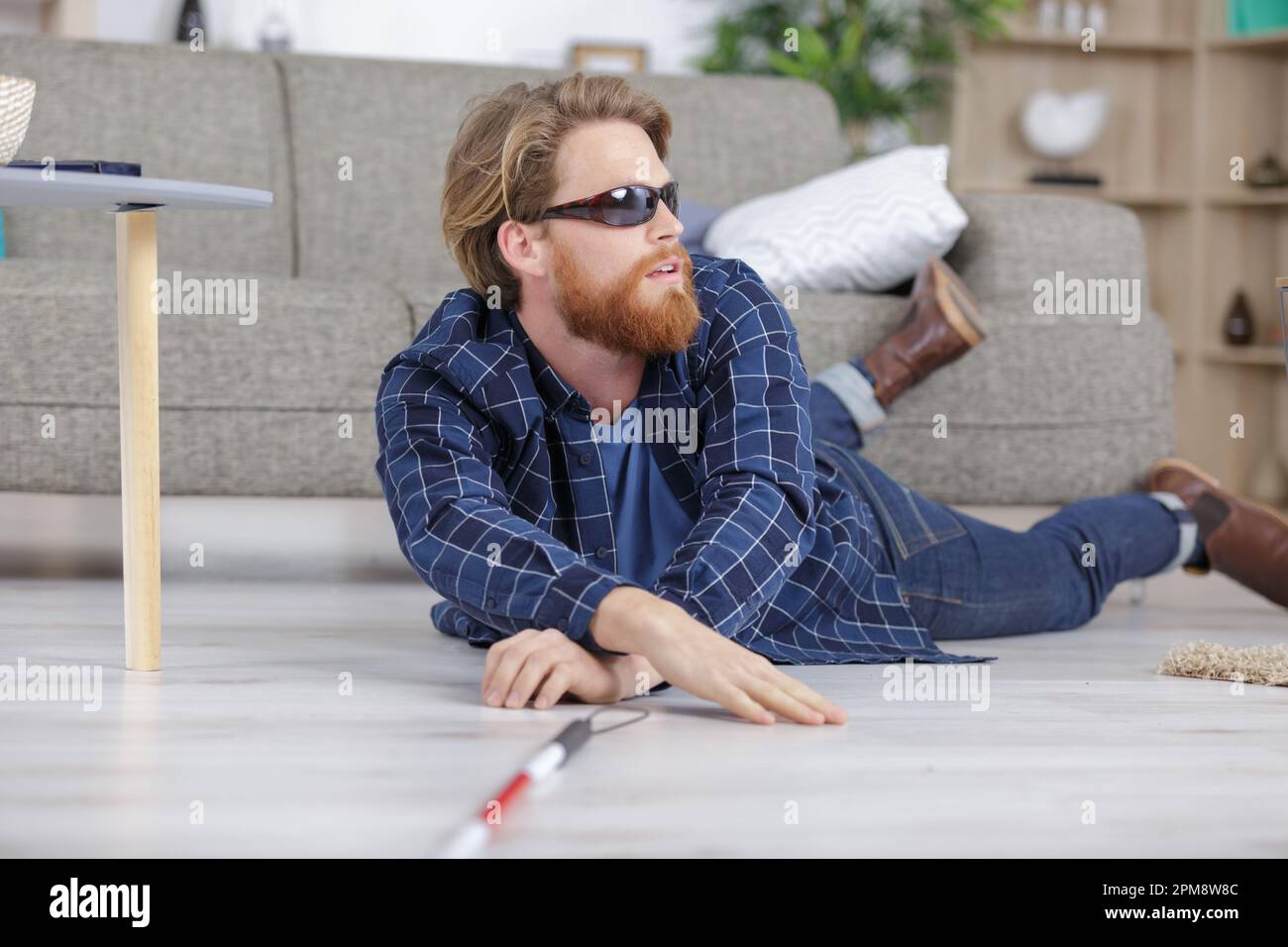 blind man fallen on the floor in his home Stock Photo - Alamy