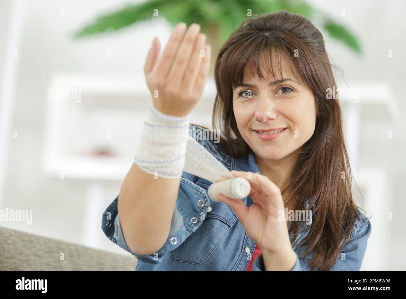 Bandaged arm hi-res stock photography and images - Alamy