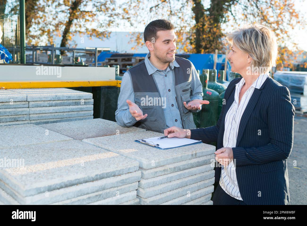 craftsman and manager in a stone factory Stock Photo - Alamy