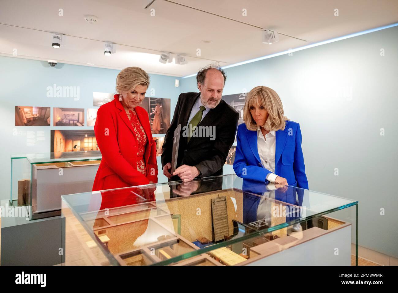 Brigitte Macron, wife of French President Emmanuel Macron, right, and ...
