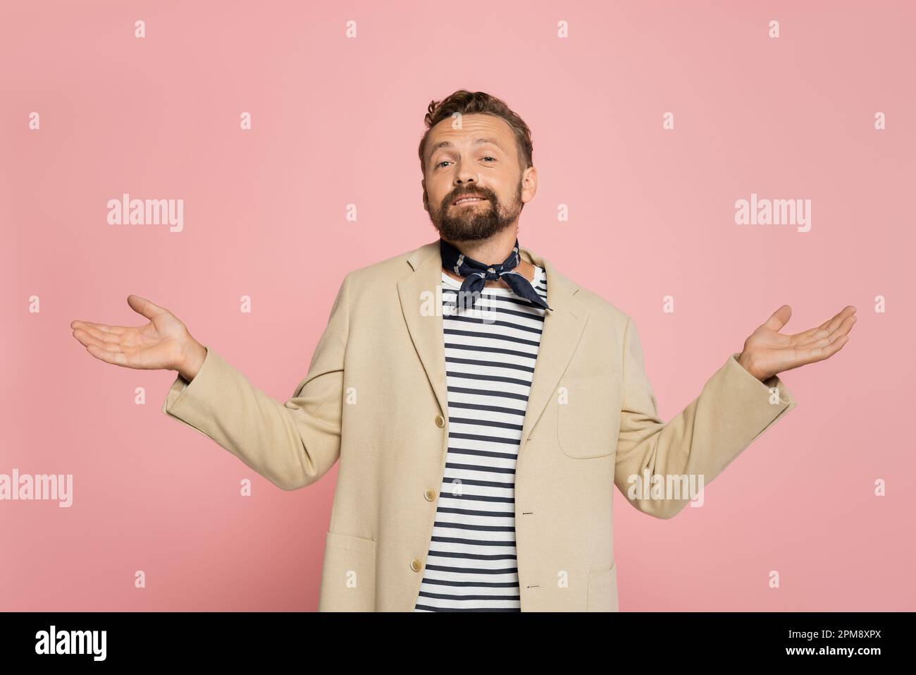 well dressed french man in blazer and neck scarf showing shrug gesture ...