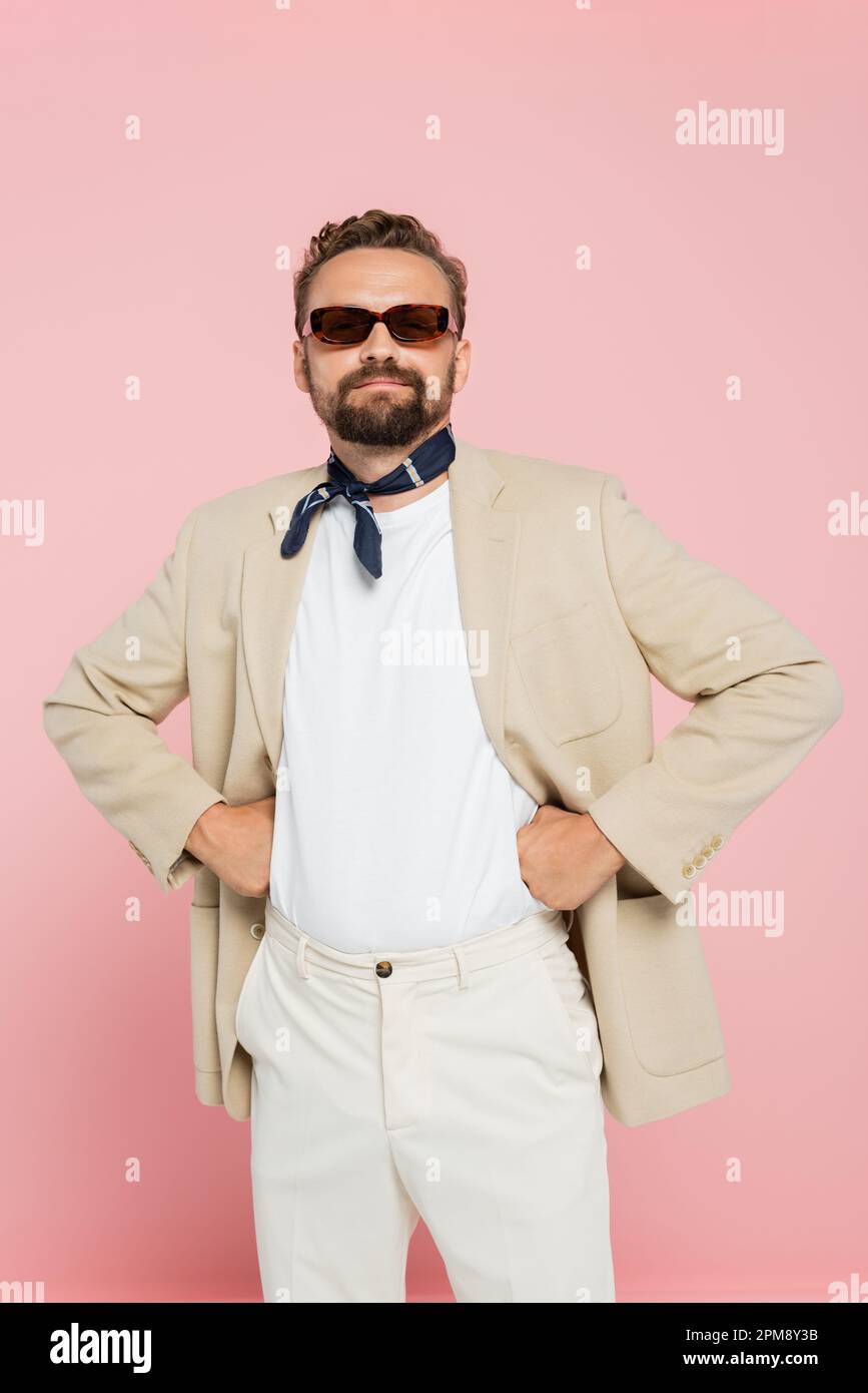 stylish french man in neck scarf and sunglasses holding posing with ...